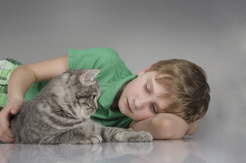 Handsome Boy with a Cute Cat Stock Image - Image of teen, animal: 67188173