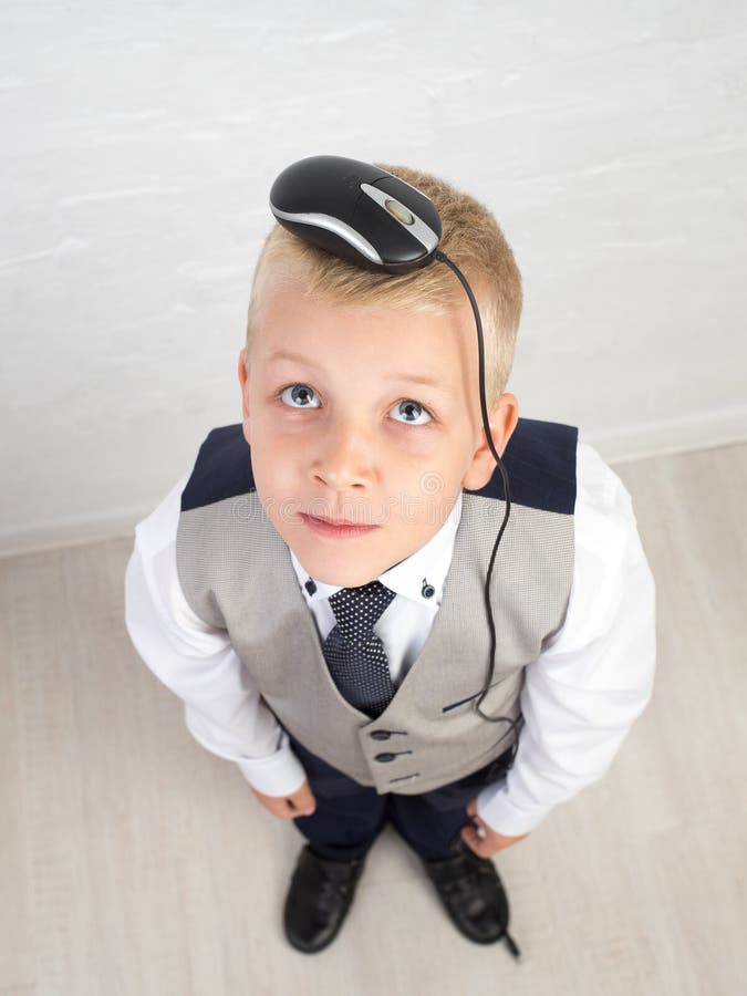 Boy with computer mouse stock photo. Image of desktop - 103080434
