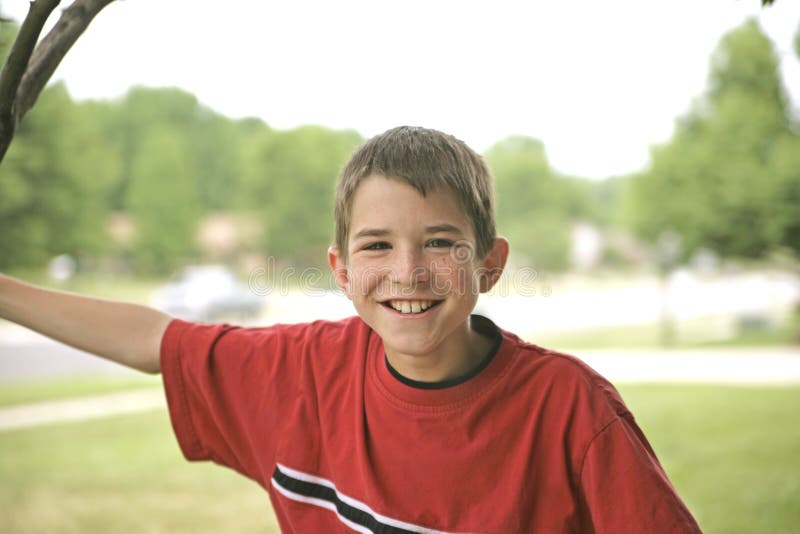 Handsome Boy in Red stock photo. Image of domestic, laughter - 2524648