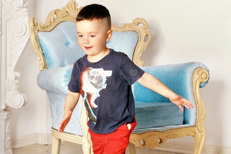 Handsome Boy Running Around the Room Stock Photo - Image of young ...