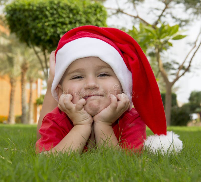 Handsome boy in santa hats stock image. Image of male - 36199389