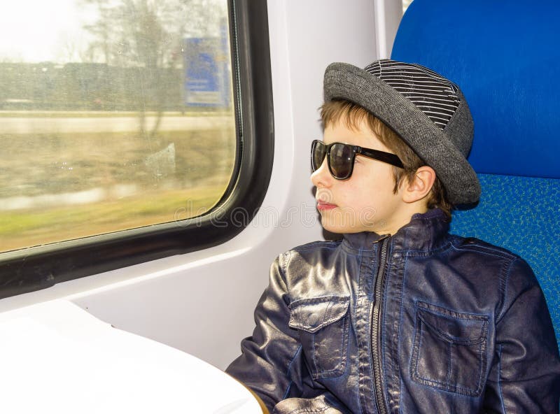 Handsome Boy in Sunglasses Rides on a Train Stock Image - Image of ...
