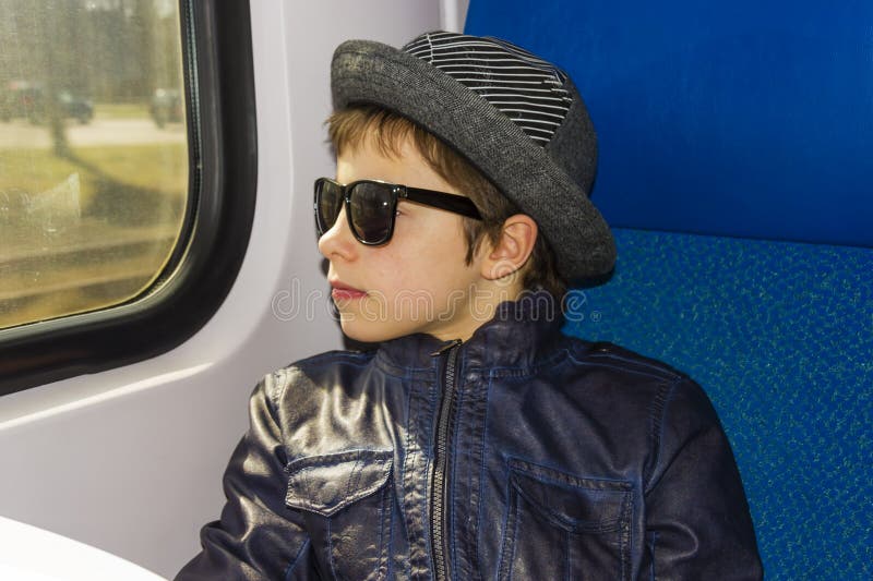 Handsome Boy in Sunglasses Rides on Train Stock Photo - Image of ...
