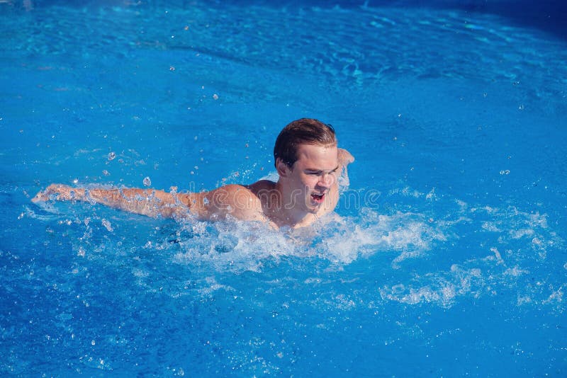 Handsome Boy Swimming in Outdoor Pool Stock Image - Image of head ...