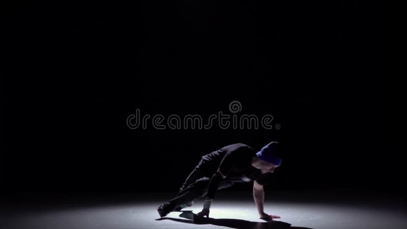 Handsome Breakdance Style Dancer Goes on Dance, on Black, Shadow, Slow ...