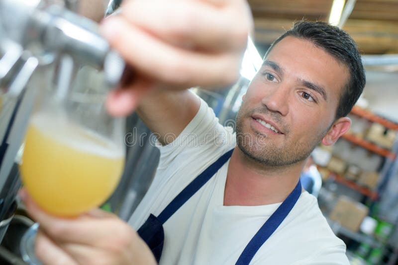 Handsome Brewer in Uniform Tasting Beer at Brewery Stock Photo - Image ...