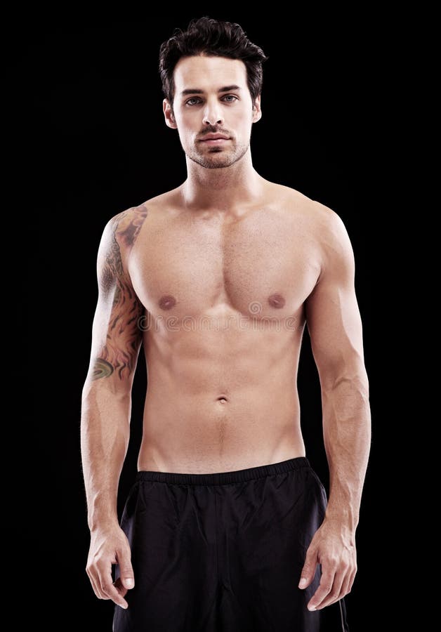 Handsome and Brooding. Studio Shot of a Bare-chest and Fit Young Man ...