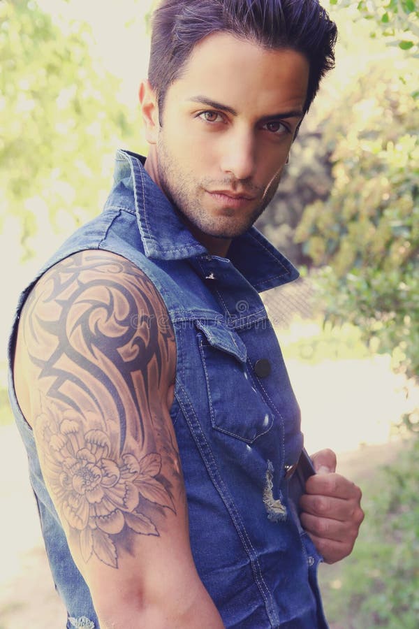 Handsome brown man posing stock image. Image of handsome - 54482787