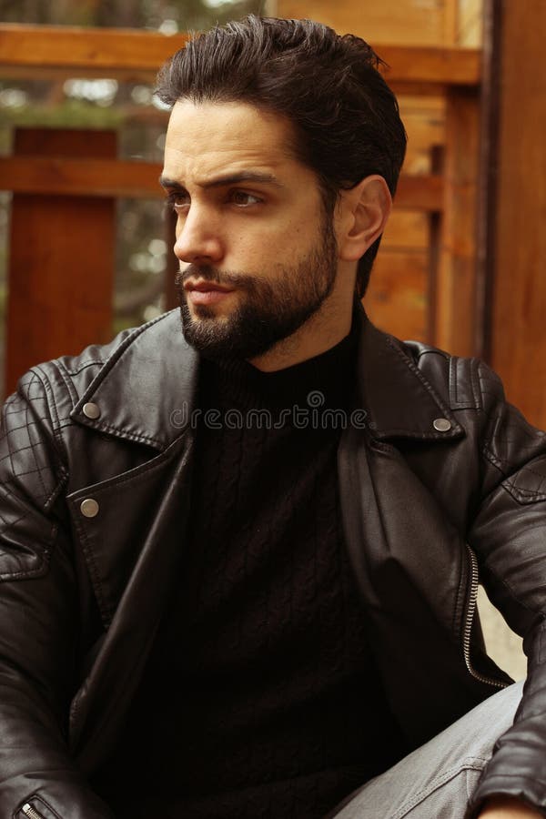 Handsome Brown Man Wearing a Black Leather Jacket Stock Photo - Image ...