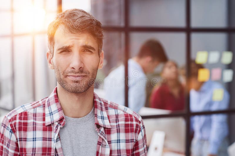 Handsome Brunette Guy Pose Alone At Workplace Or Loft Apartment Look At