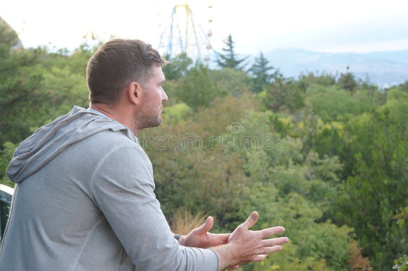 Handsome, Brutal Guy Staring into the Distance on the Background of a ...