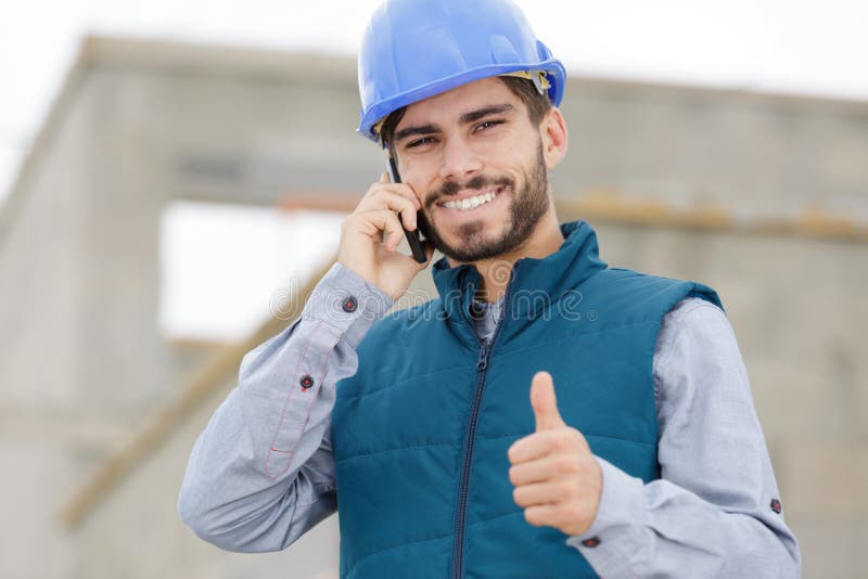 Handsome Builder Showing Thumbs Up and Laughing Stock Photo - Image of ...