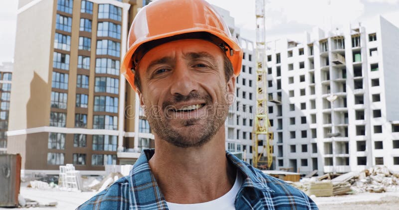Handsome Builder Smiling at Camera on Stock Image - Image of equipment ...