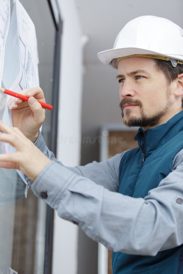 Handsome Builder Writing Plan Indoors Stock Photo - Image of foreman ...