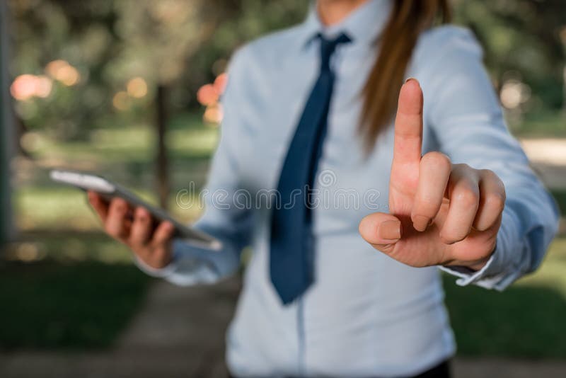 Handsome Business Girl Pointing with Finger into Empty Space. Copy ...