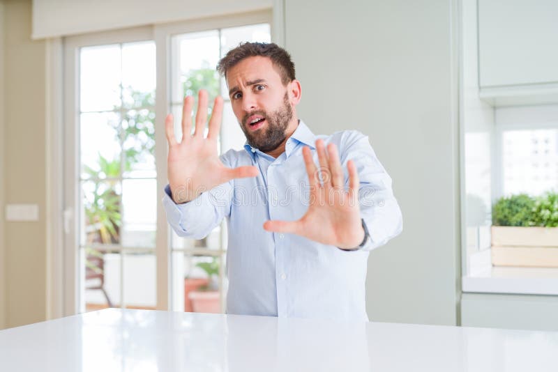 Handsome Business Man Afraid and Terrified with Fear Expression Stop ...