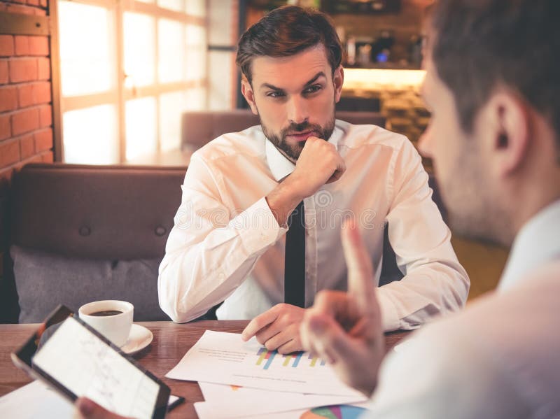 Handsome business partners stock image. Image of colleagues - 83942227