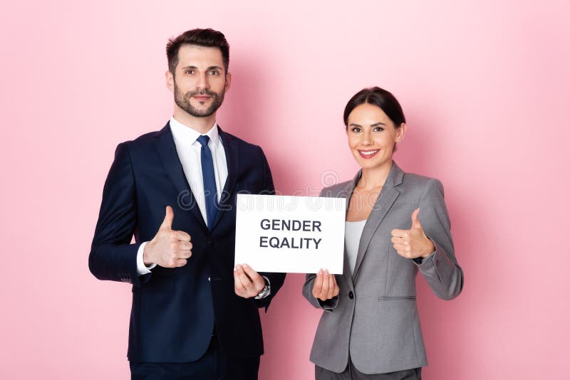 Handsome Businessman And Businesswoman Holding Placard With Gender