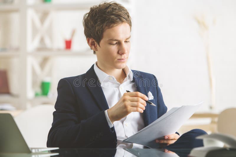 Handsome Businessman Doing Paperwork Stock Photo - Image of office ...