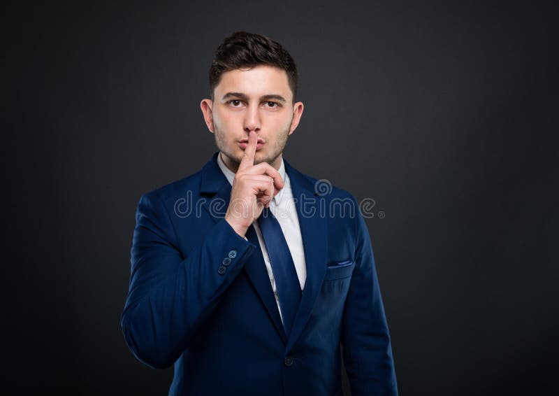 Handsome Businessman Doing Silence Gesture Stock Image - Image of ...