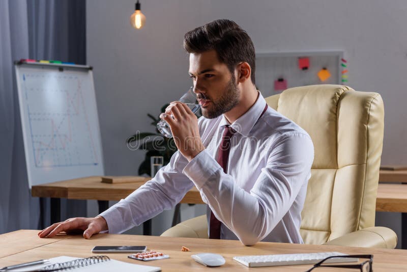Handsome Businessman Drinking Water Stock Photo - Image of drink ...
