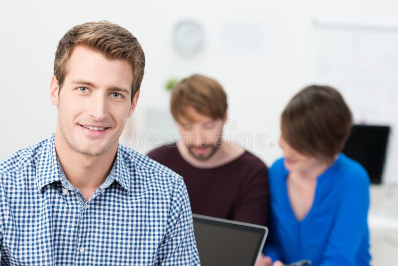Handsome Businessman with a Friendly Smile Stock Photo - Image of ...