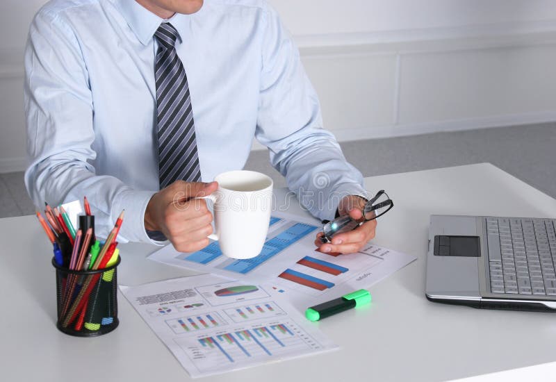 Handsome Businessman Having Tea or Coffee in Office Stock Photo - Image ...