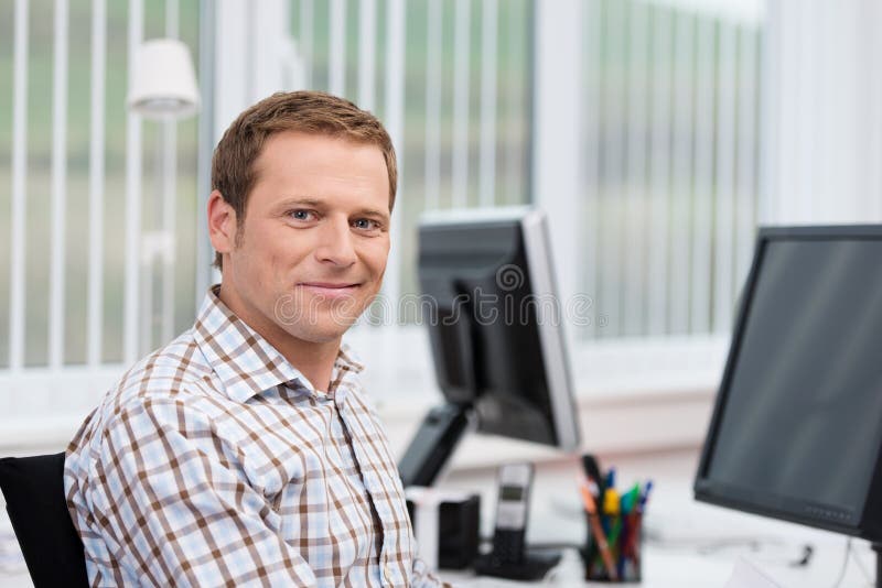 Handsome Businessman at His Desk Stock Photo - Image of friendly ...