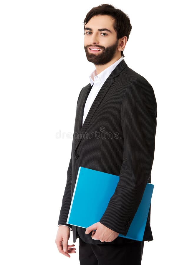 Handsome Businessman Holding a Binder. Stock Photo - Image of document ...