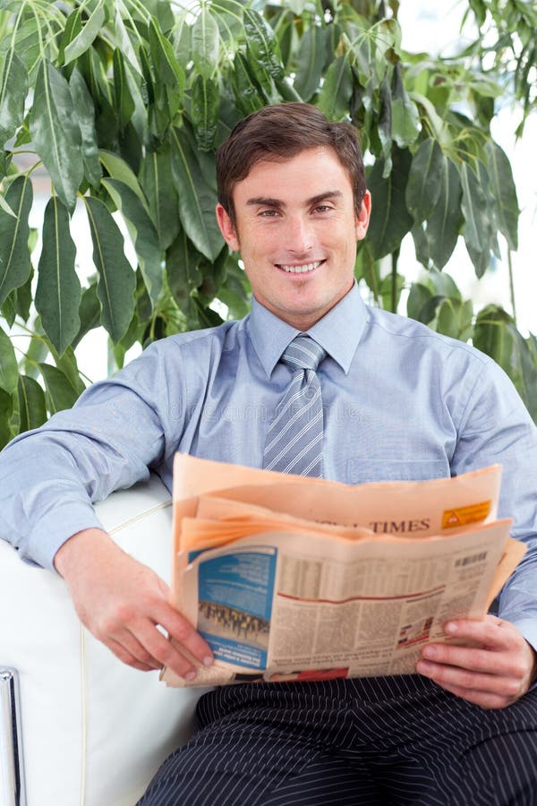 Businessman Reading Newspaper Stock Image - Image of reading, outdoors ...