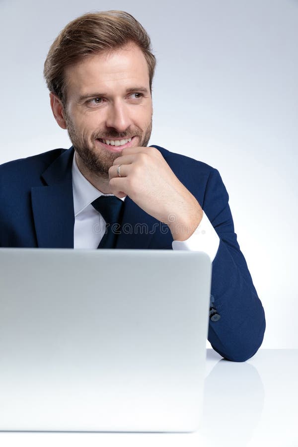Handsome Businessman Smiling with His Hand on His Chin Stock Image ... Handsome Businessman Smiling with His Hand on His Chin Stock Image ...