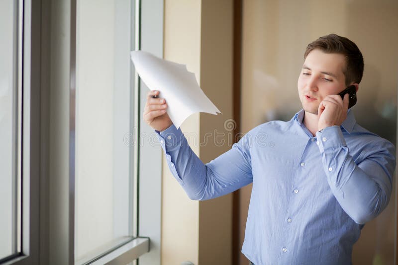 Handsome Businessman, Speaking on the Phone in Office Stock Image ...