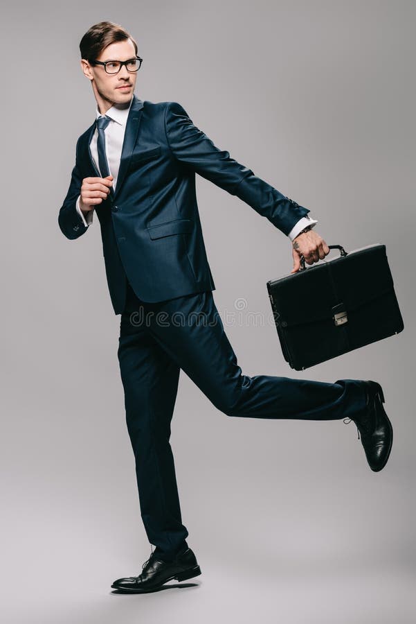 Businessman Running from Journalists with Digital Video Camera Stock ...