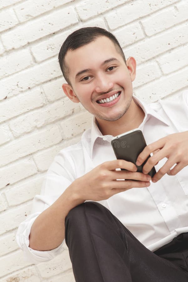 Handsome Businessman Texting on Mobilephone Stock Image - Image of ...