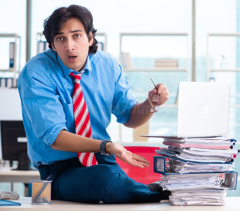 Handsome Businessman Unhappy with Excessive Work in the Office Stock ...