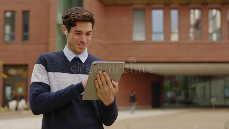 Handsome Businessman Using His Tablet Computer. Guy Working on Digital ...