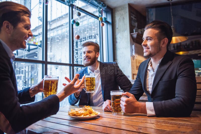 Men at the pub stock image. Image of holding, manager - 291406611