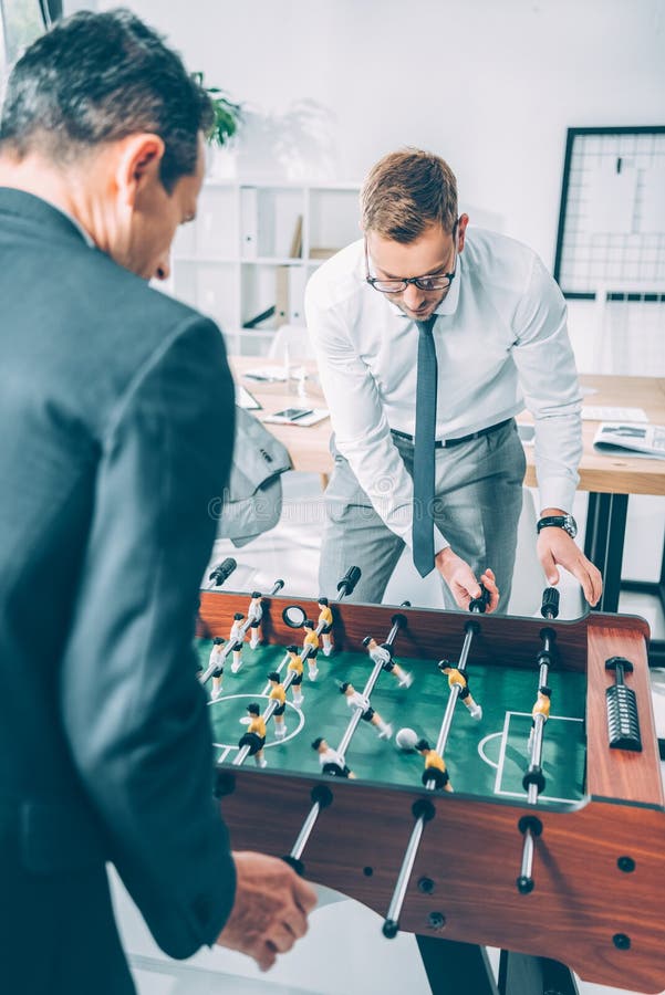 Businessmen Playing Table Football in Modern Stock Photo - Image of ...