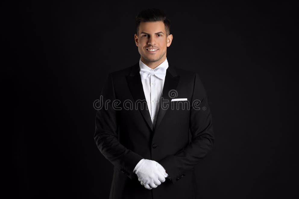 Handsome Butler in Elegant Uniform on Black Background Stock Image ...