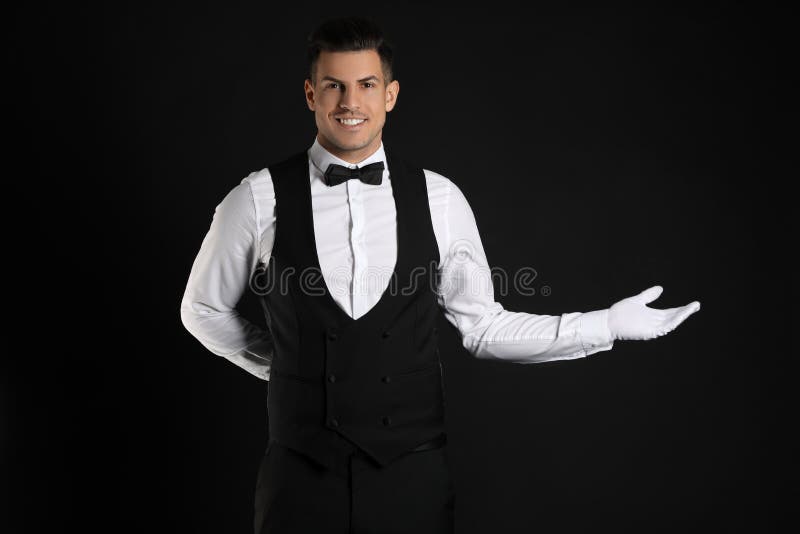 Handsome Butler in Elegant Uniform on Grey Background Stock Image ...