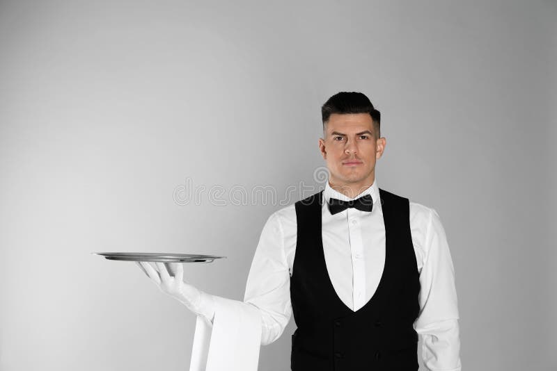 Handsome Butler in Elegant Uniform on White Background Stock Photo ...