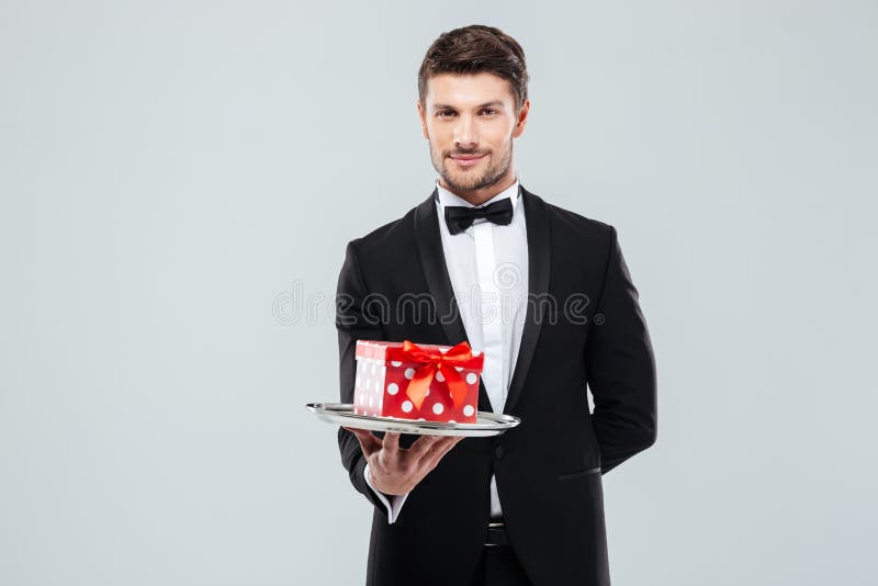 Handsome Butler in Tuxedo with Bowtie Gift Box on Tray Stock Photo ...