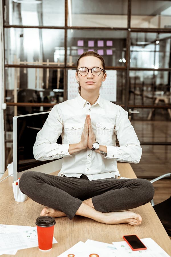 Handsome Calm Man Sitting with His Eyes Closed Stock Photo - Image of ...