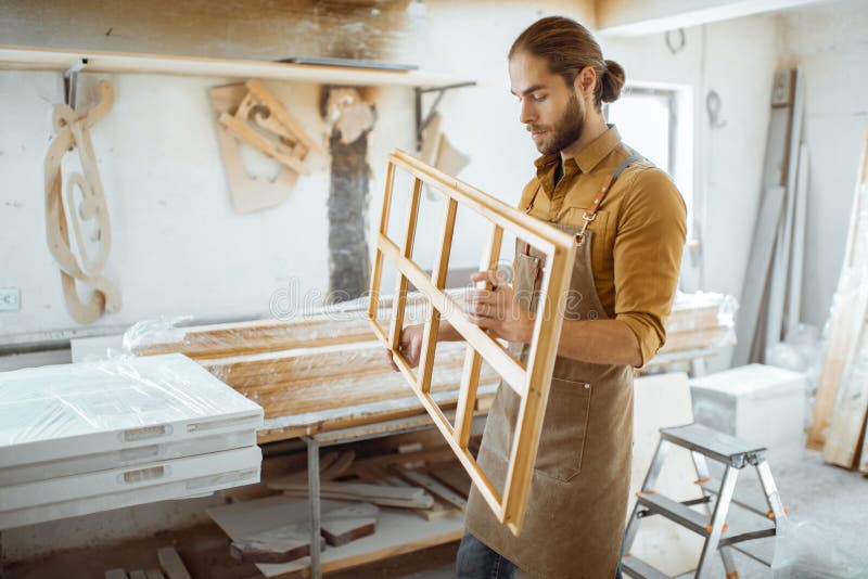Carpenter with Window Frame at the Workshop Stock Photo - Image of ...