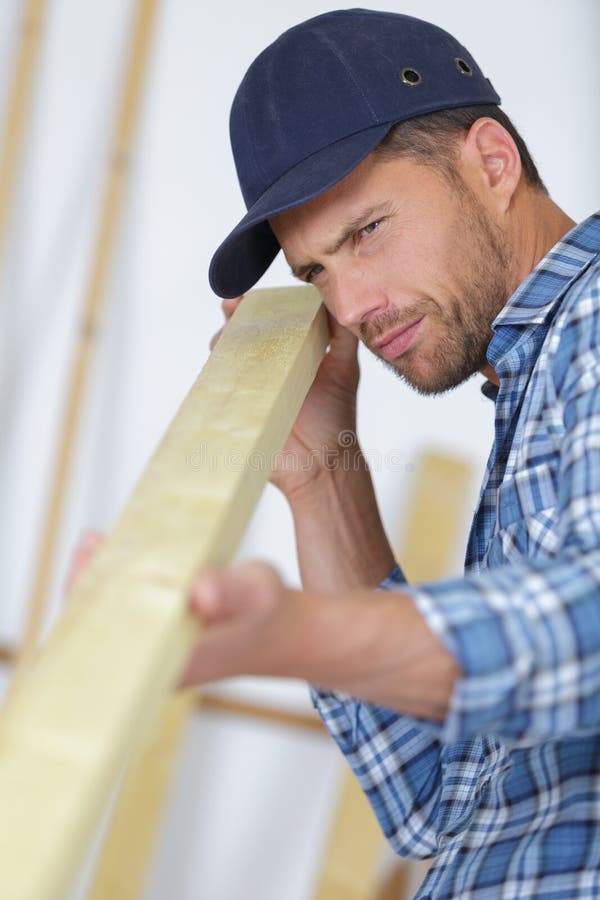 Handsome Carpenter Measuring Wood Stock Image - Image of design, ruler ...