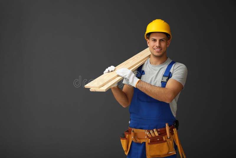 Handsome Carpenter with Tool Box on Dark Background, Space for Text ...