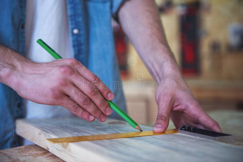Handsome carpenter working stock image. Image of plank - 287769675