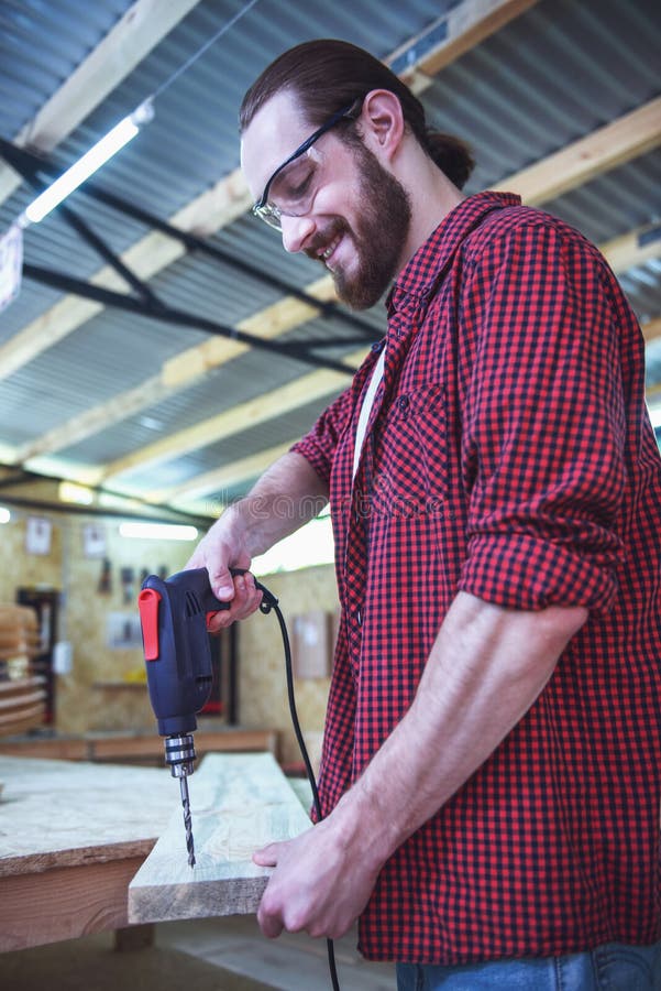 Handsome carpenter working stock photo. Image of handsome - 287770096