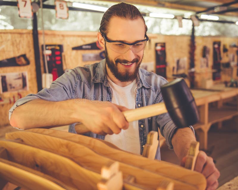 Handsome carpenter working stock image. Image of carpenter - 76913497