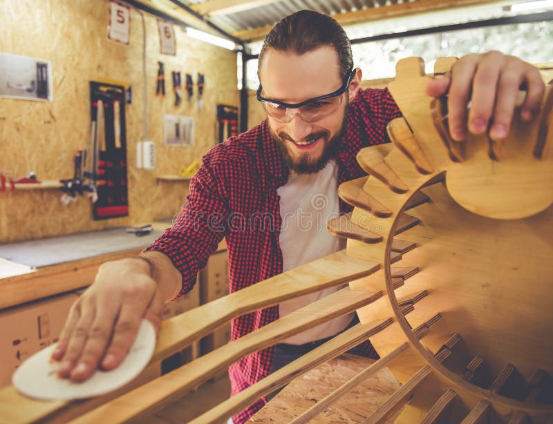 Handsome carpenter working stock image. Image of carpenter - 76913519